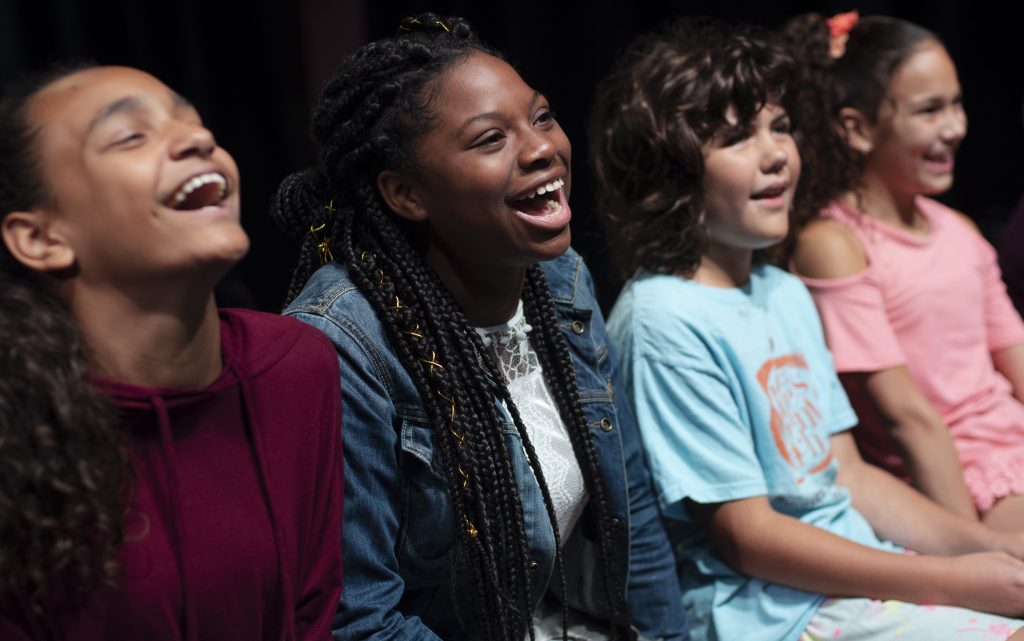 Student Matinee Kids Laughing - Collaborative School of the Arts